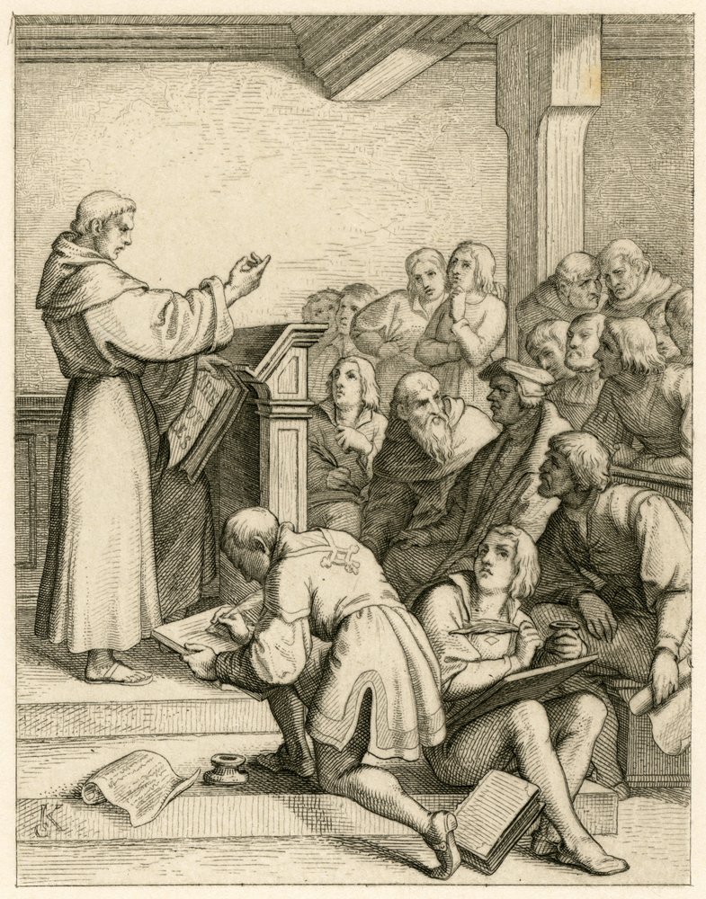 Martin Luther holder forelesninger på universitetet i Wittenberg, foran ...